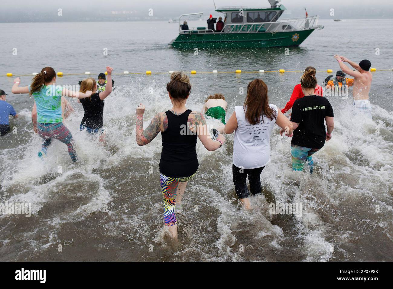 People participate in this year's Polar Plunge at Broughton Beach on ...