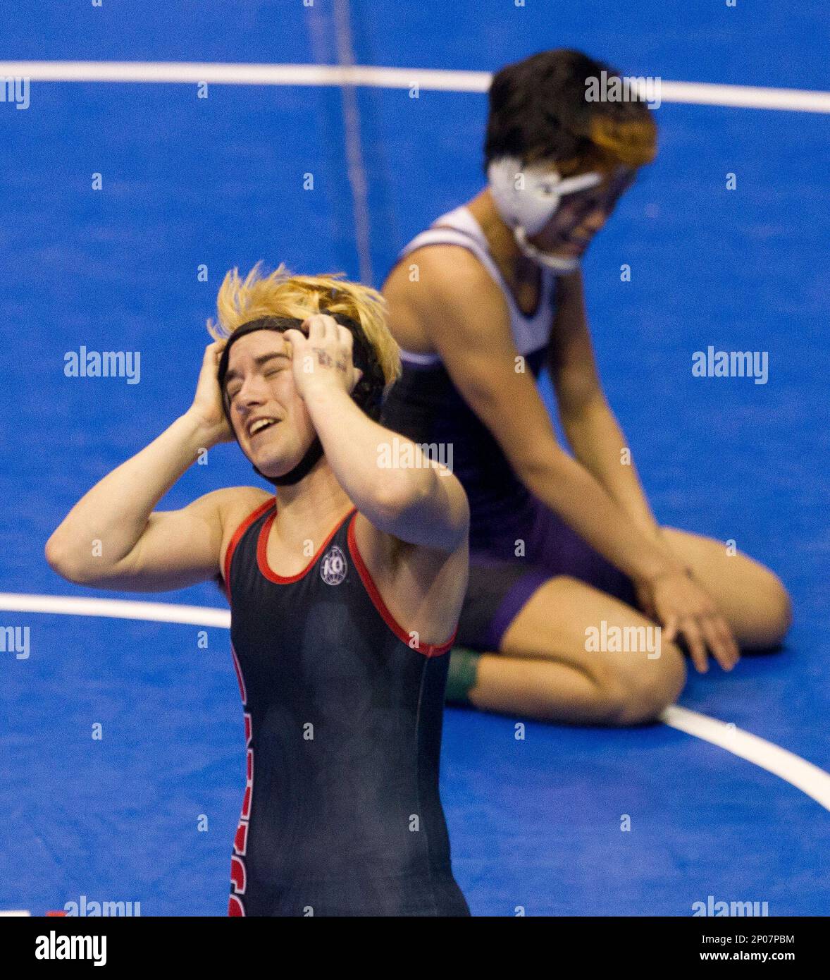 Euless Trinity's Mack Beggs, front, reacts after defeating Morton Ranch ...