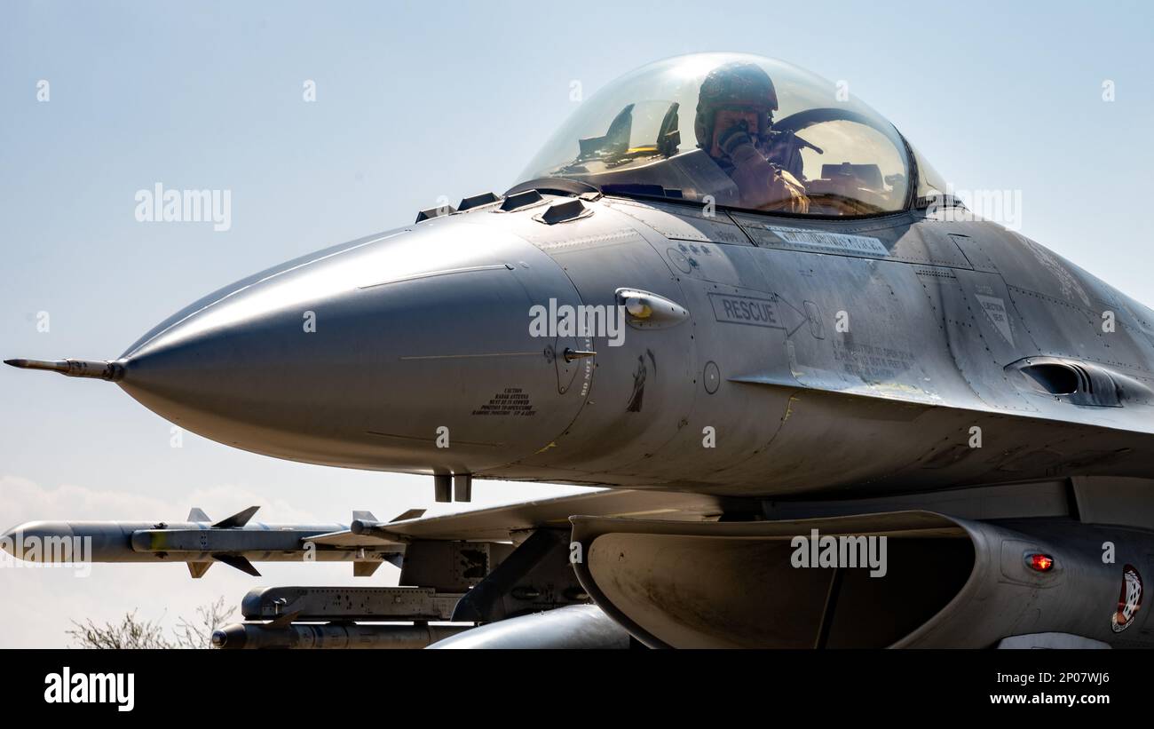 A U.S. Air Force pilot assigned to the 77th Expeditionary Fighter ...
