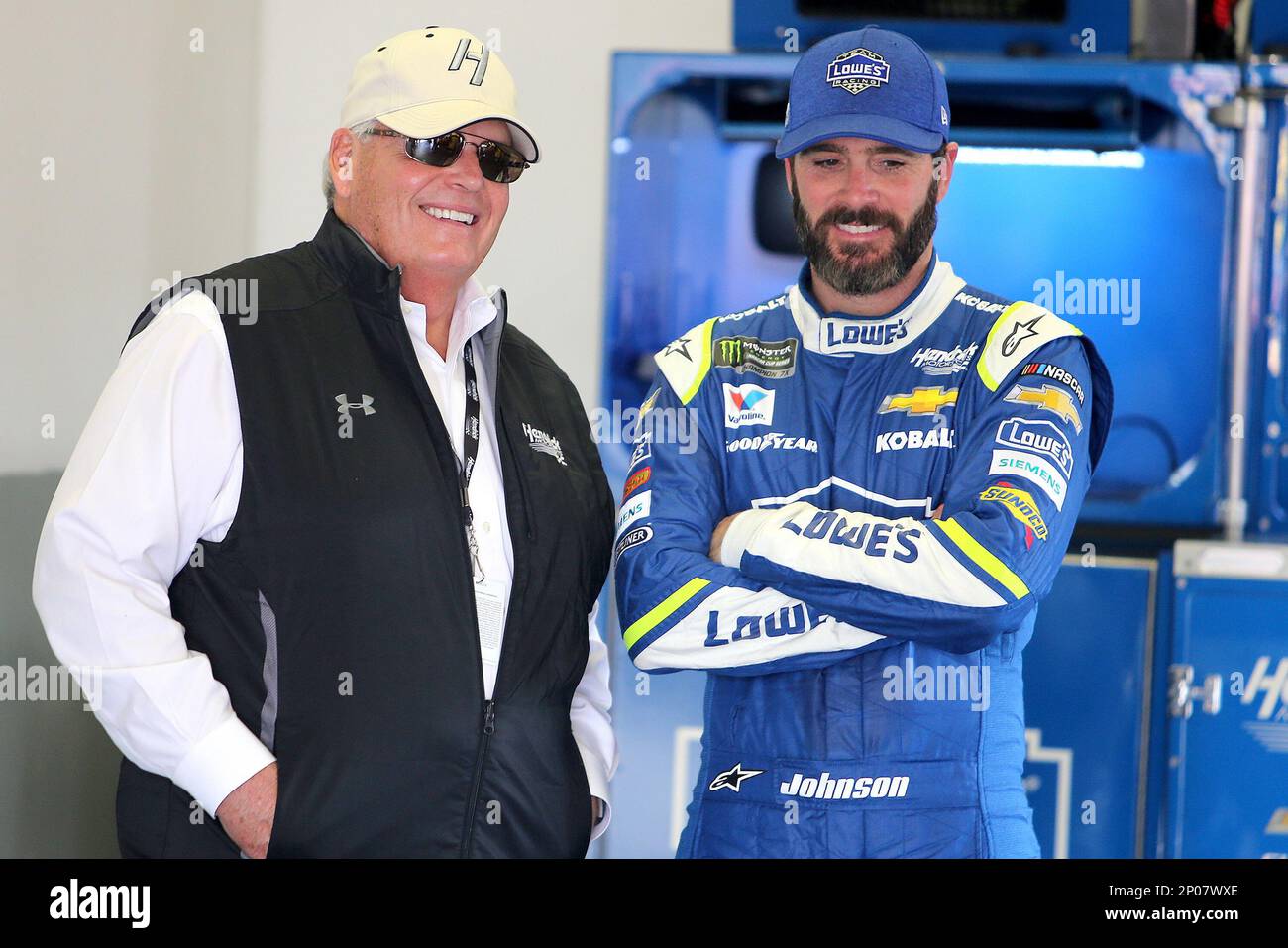 Team owner Rick Hendrick (L) and Sprint Cup Series driver Jimmie ...