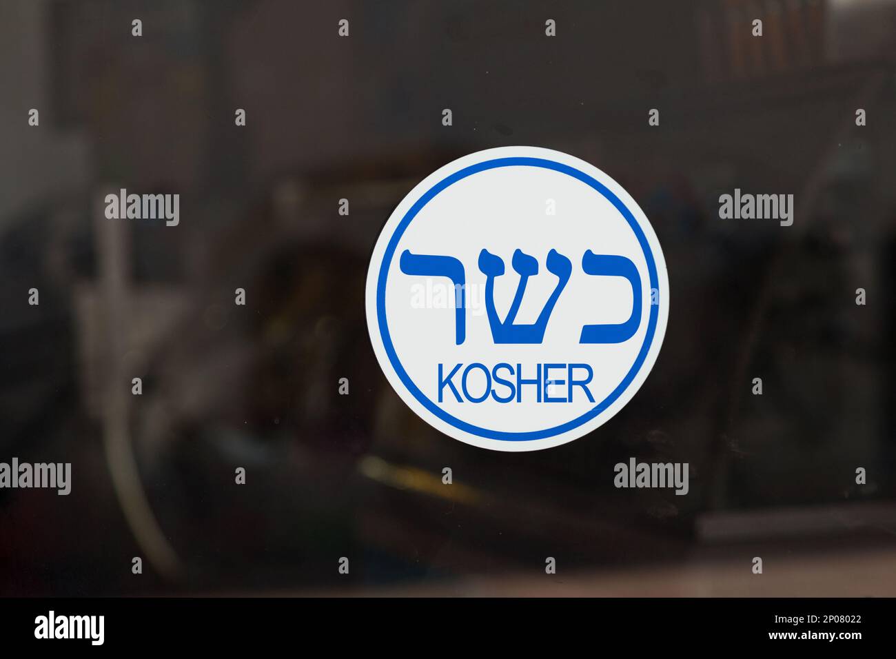 Circular sign in a window with written in Hebrew "Kosher Stock Photo ...