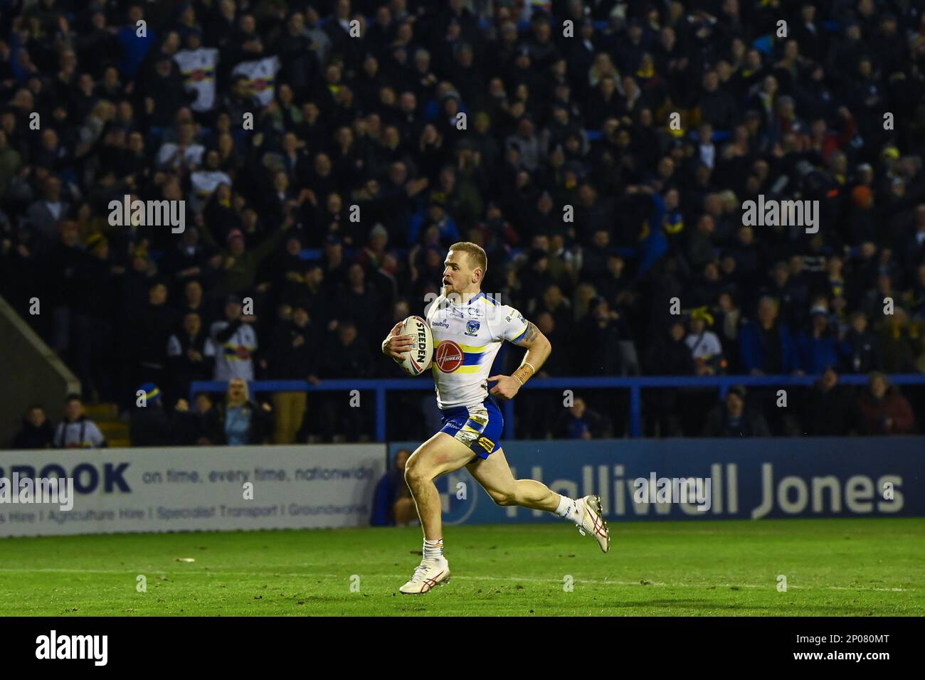 Matt Dufty #1 of Warrington Wolves makes a break during the Betfred ...