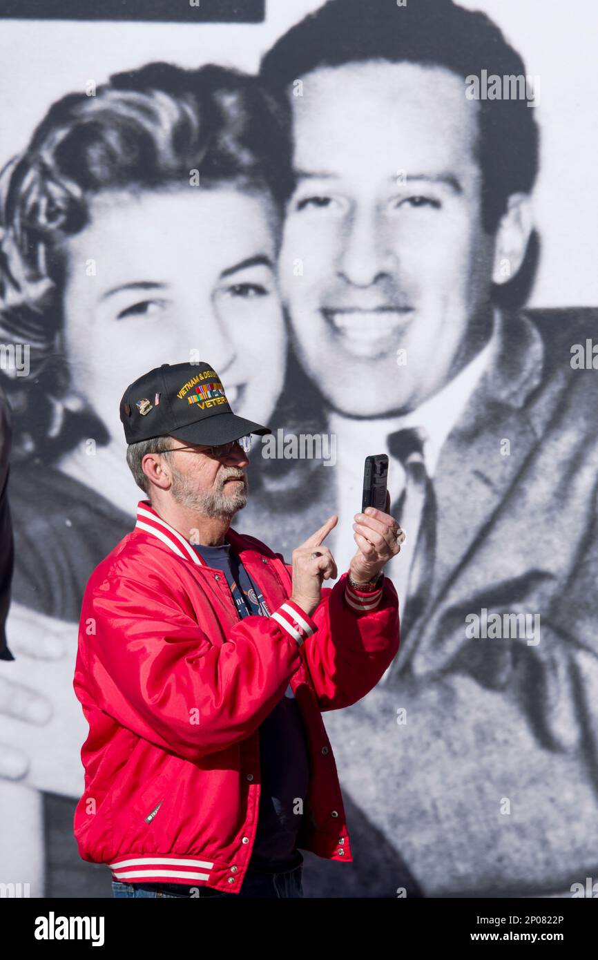 Jim Rockwell, of Goldwater, MI., takes photos at the memorial. Photos ...