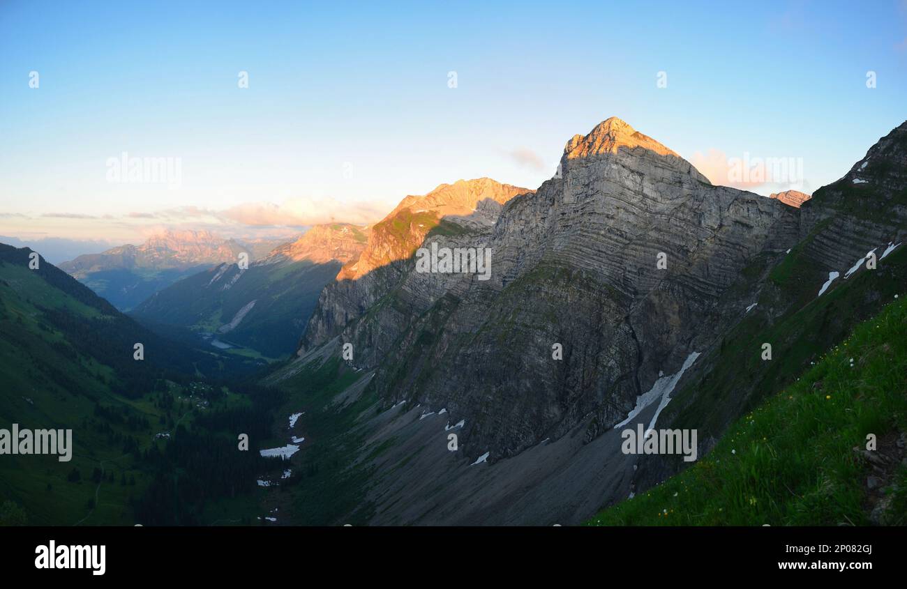 last rays of sun in the swiss alps. sunset in glarus. wanderlust. High ...