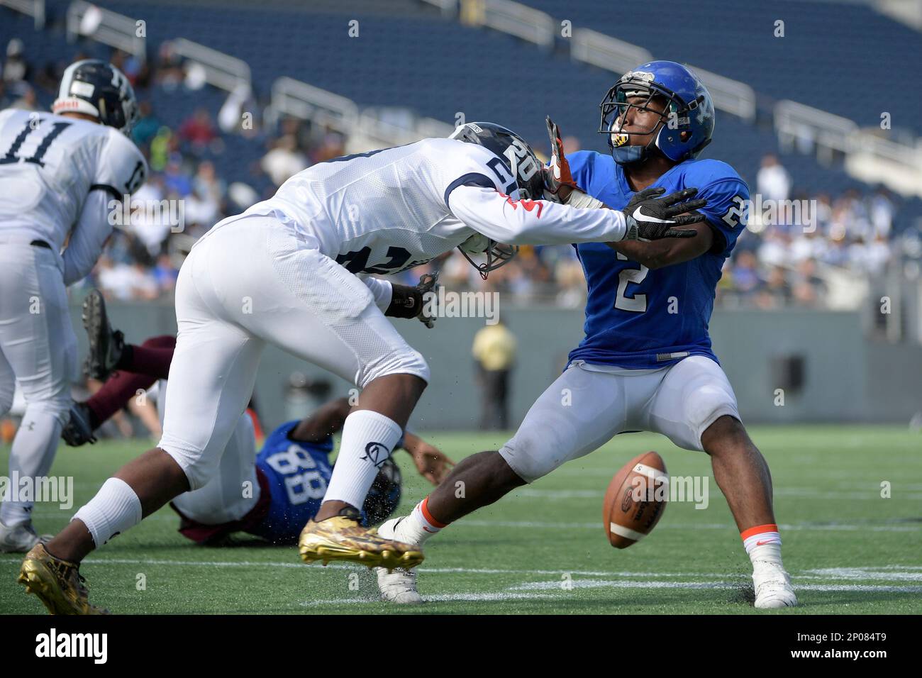 Trinity Christian running back Rasheed Martin (2) fumbles the ball as ...