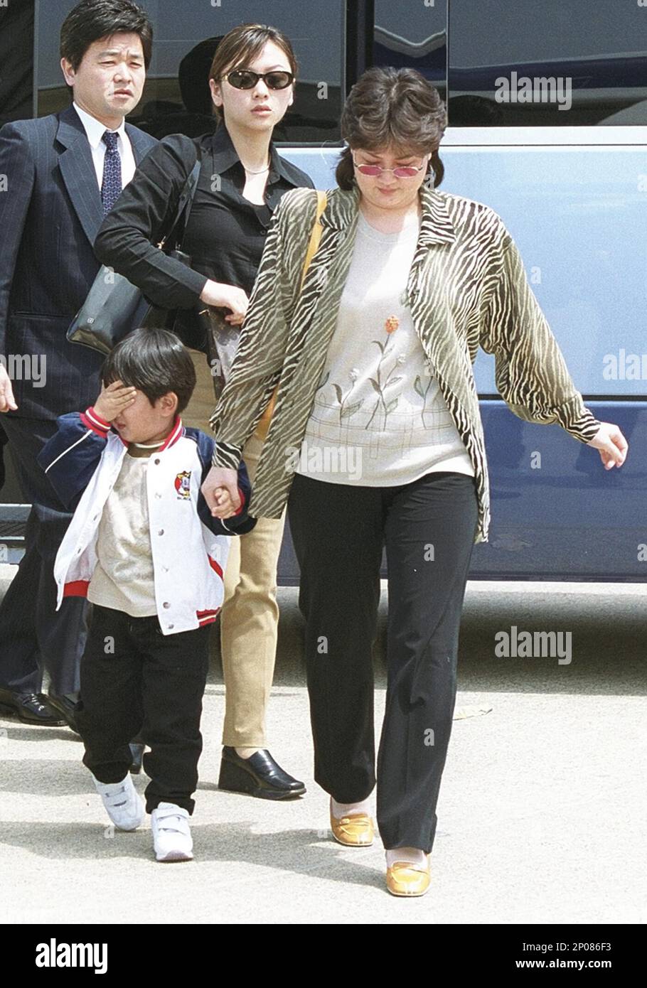 File: A photo shows a boy (L) who believed to be Kim Han Sol, the son ...