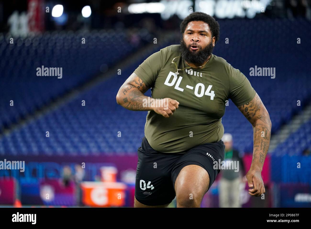 Coastal Carolina defensive lineman Jerrod Clark runs a drill at the NFL ...