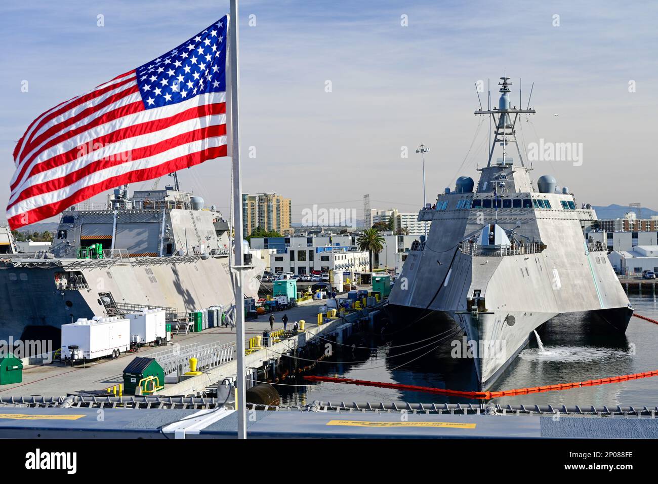 The U.S. flag flies aboard the Independence-class littoral combat ship ...