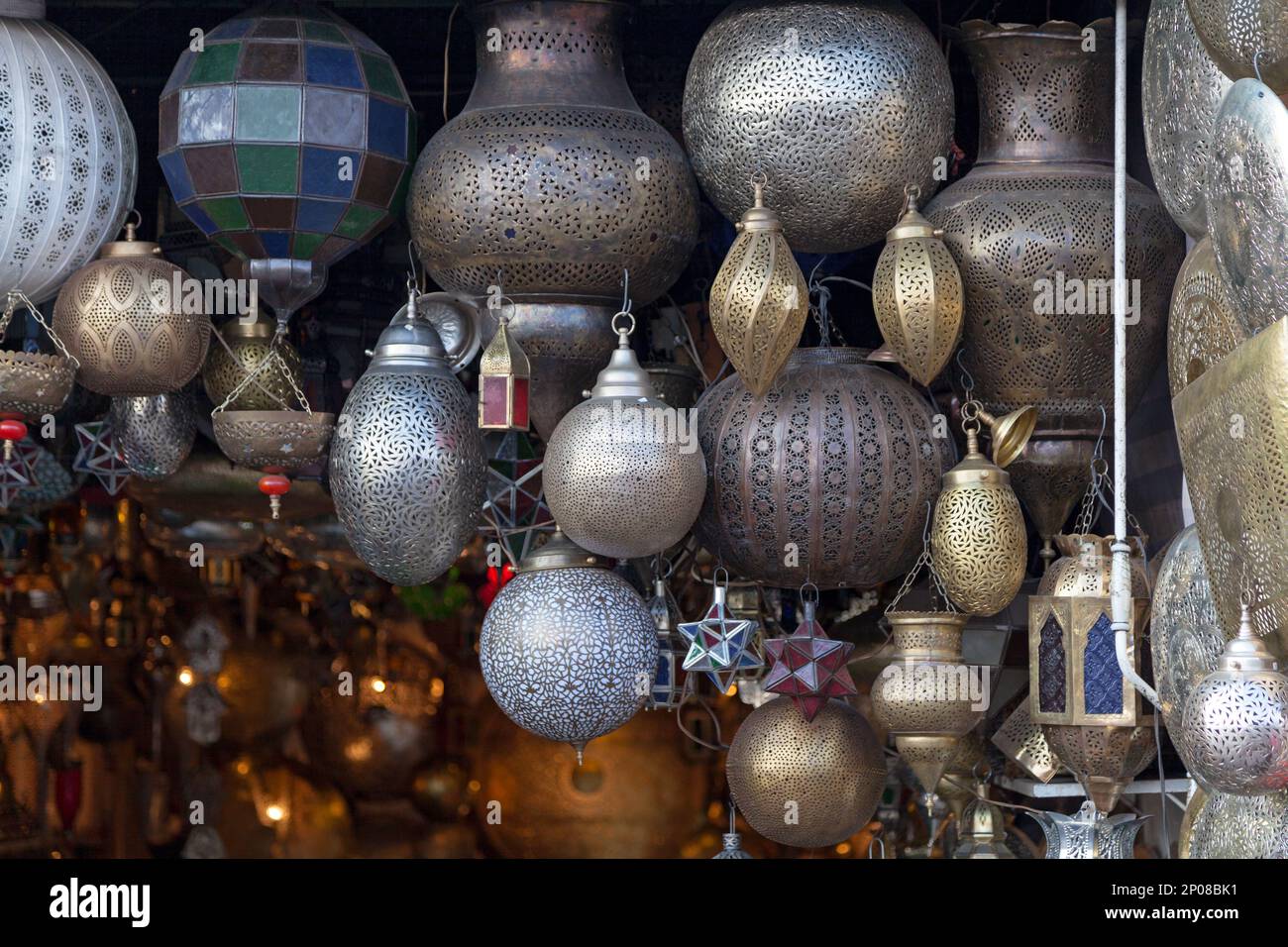Various traditional Moroccan crafted lamps on display in the souk of ...