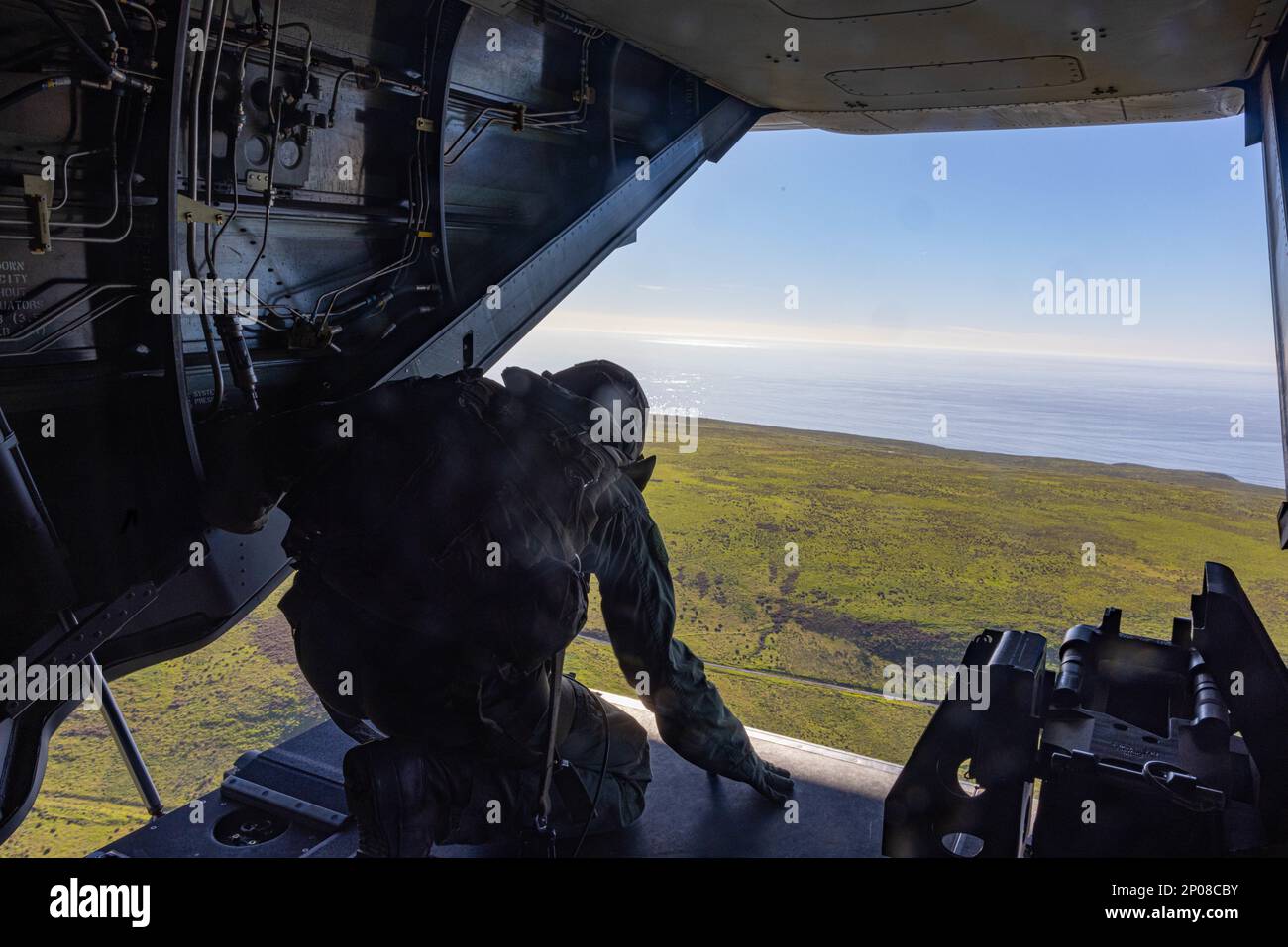 U.S. Marine Corps Lance Cpl. Carson Green, a tiltrotor crew chief with ...