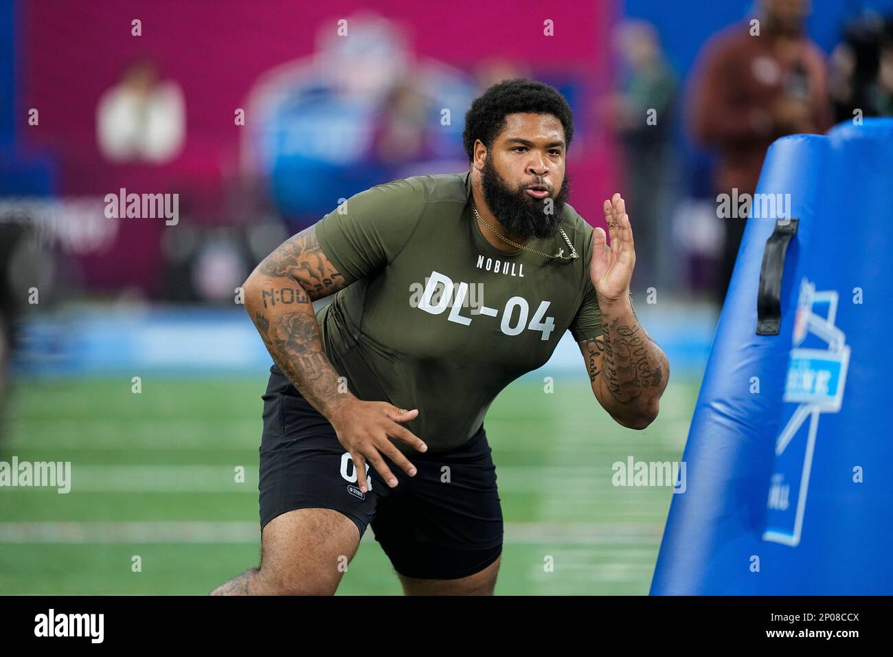 Coastal Carolina defensive lineman Jerrod Clark runs a drill at the NFL ...