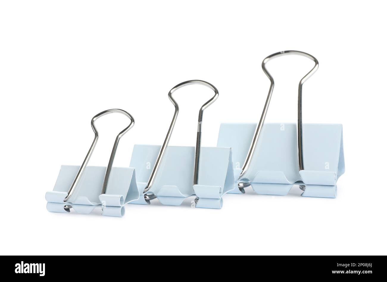 Different binder clips on white background. Stationery item Stock Photo ...