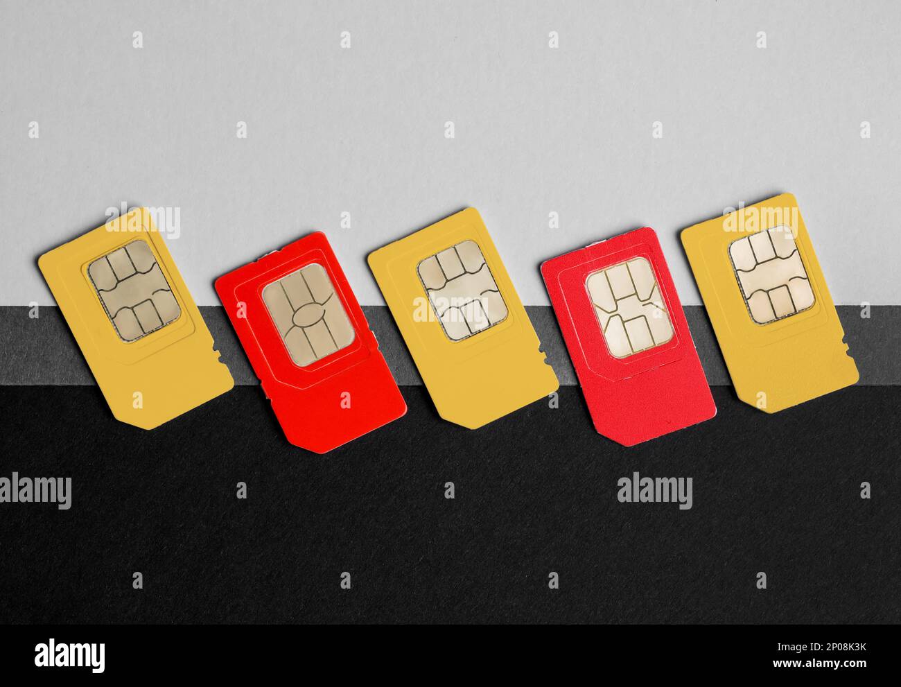 Different SIM cards on color background, flat lay Stock Photo - Alamy