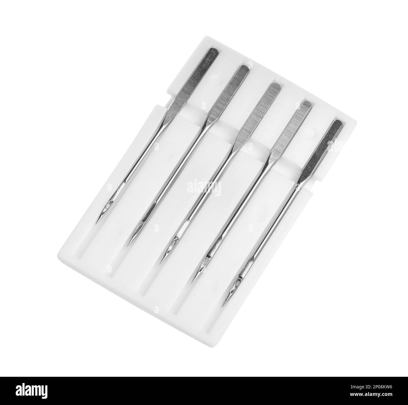 Set of metal needles for sewing machine on white background Stock Photo ...