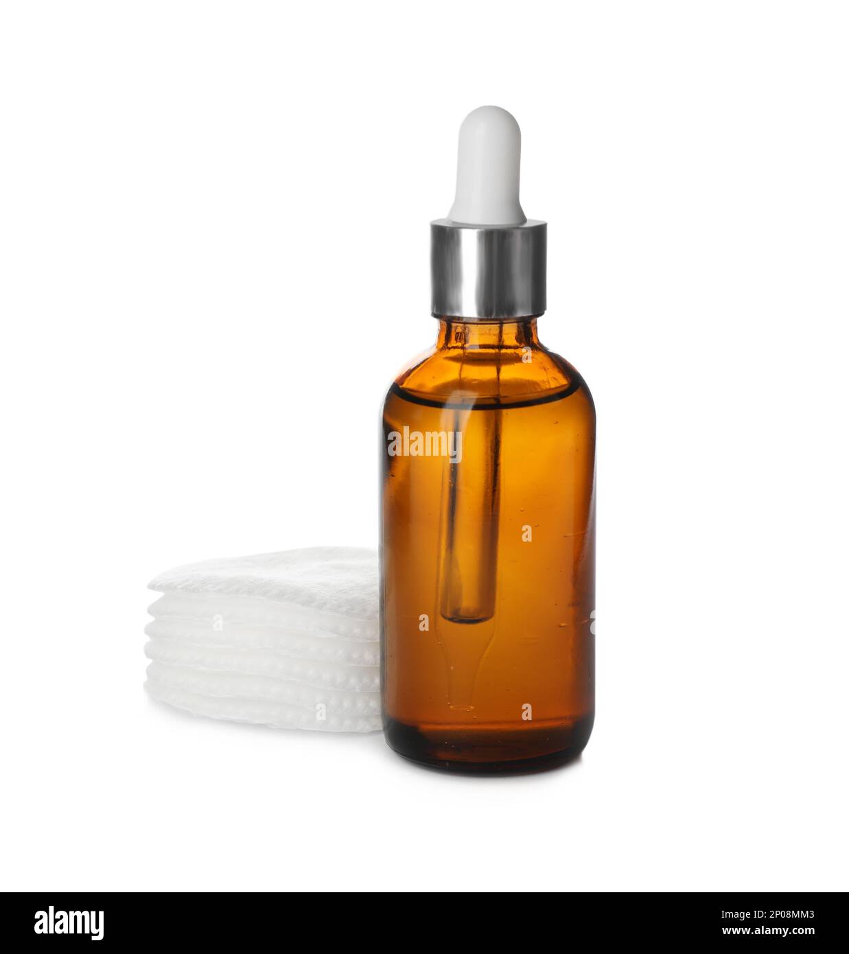 Cosmetic product and cotton pads for makeup removal on white background ...