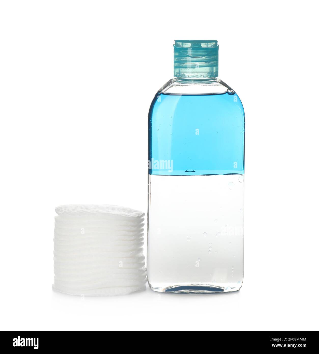 Cosmetic product and cotton pads for makeup removal on white background ...