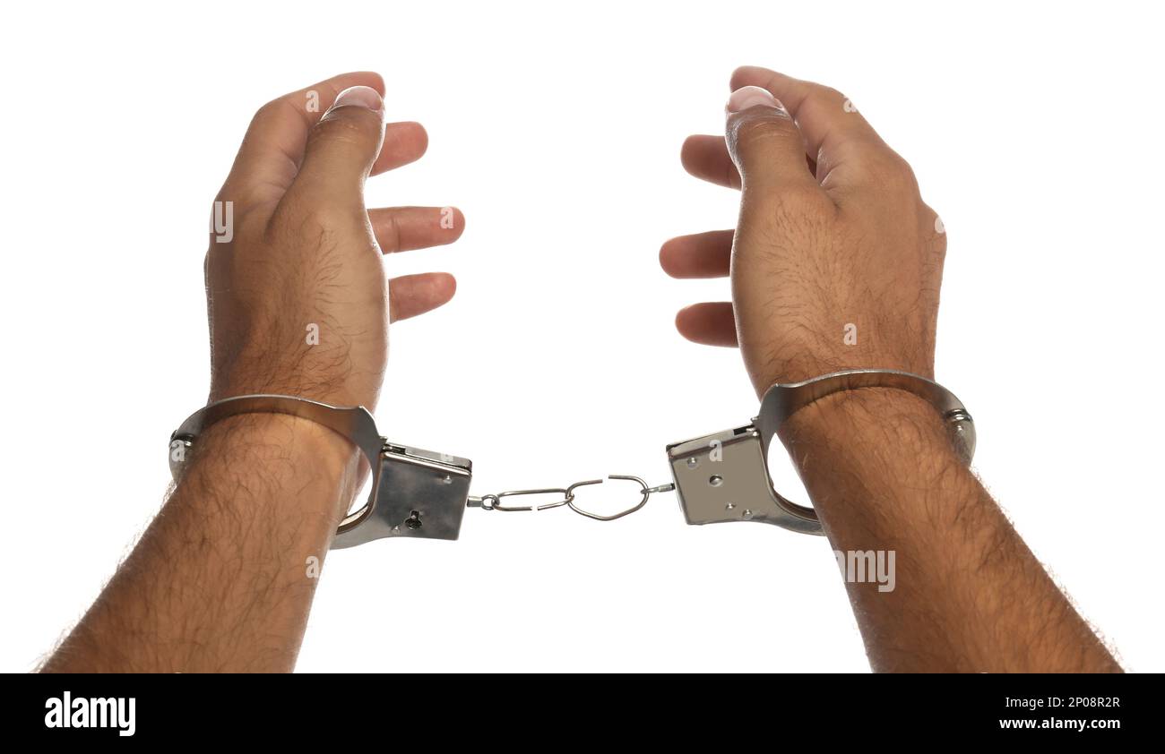 Man in handcuffs hi-res stock photography and images - Alamy