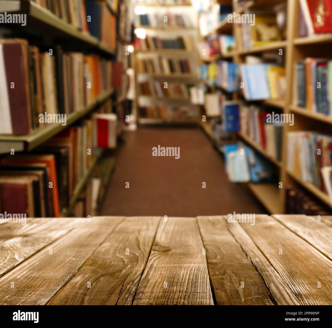 Empty wooden table in library. Space for design Stock Photo - Alamy