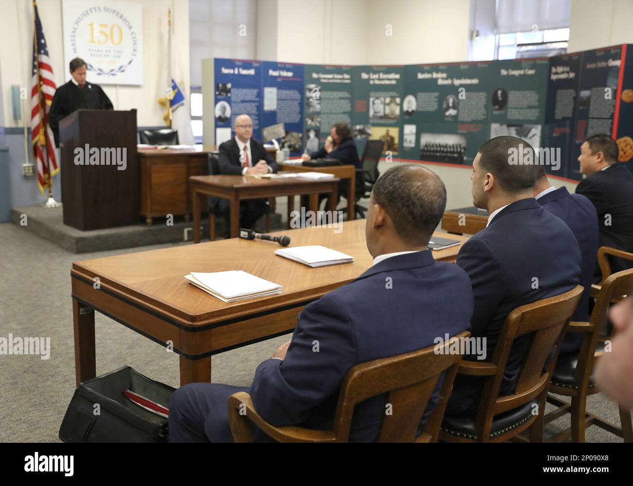Former New England Patriots tight end Aaron Hernandez, second from left ...