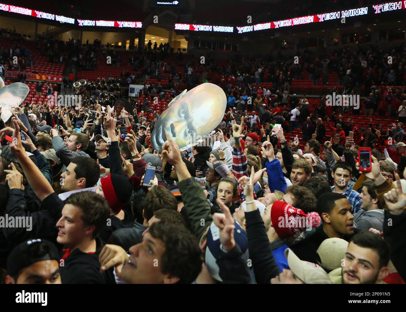 LUBBOCK, TX - FEBRUARY 13: Fans swarm the court after the Texas Tech ...