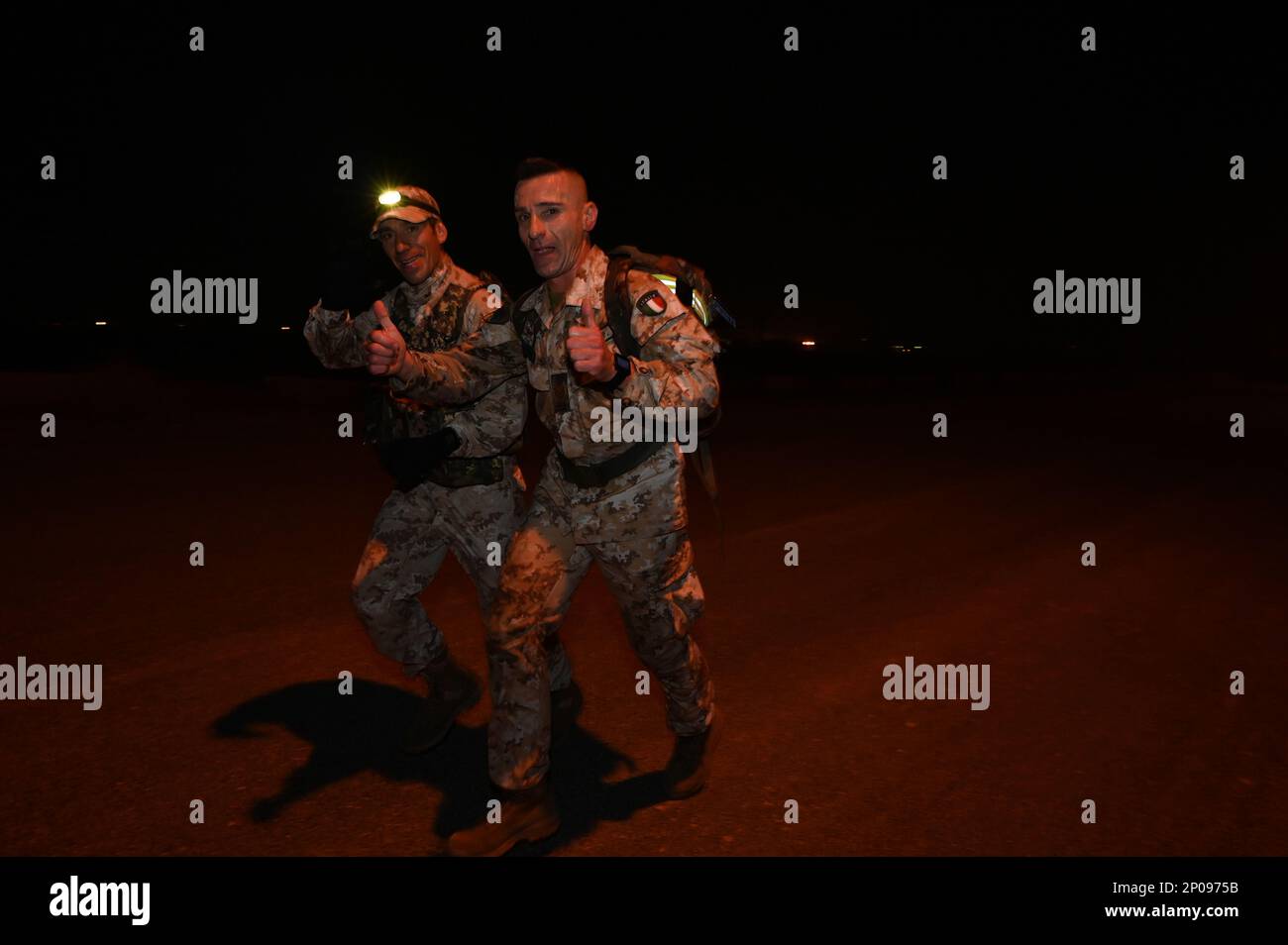 Italian Coalition Partners run the 13-mile DANCON march at Ali Al Salem ...