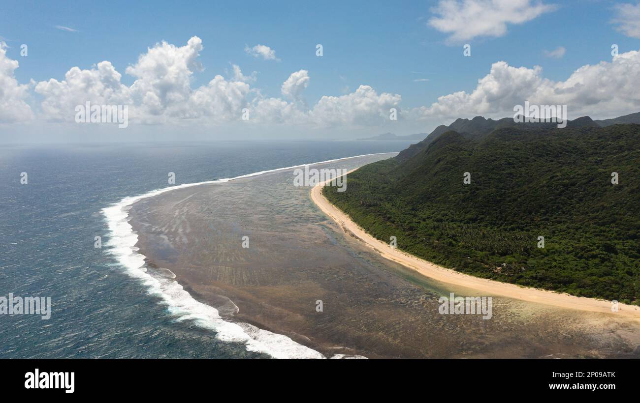 Aerial drone of tropical island coastline and blue ocean. Luzon, Santa ...