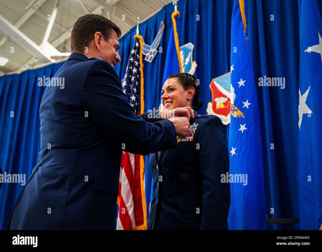U.S. Air Force Maj. Katie Lunning, 133rd Medical Group, receives the ...
