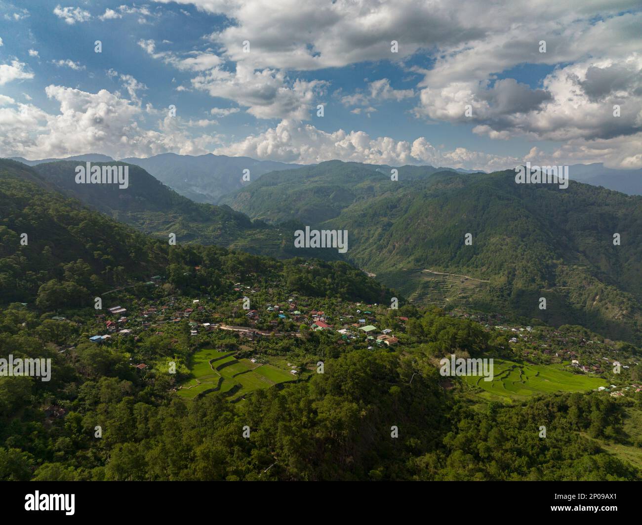 Agricultural plantations and rice terraces on hillsides in a ...