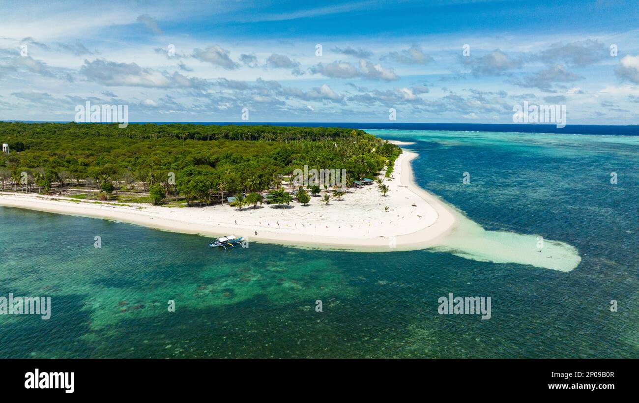 Island with beautiful beach, palm trees by turquoise water view from ...