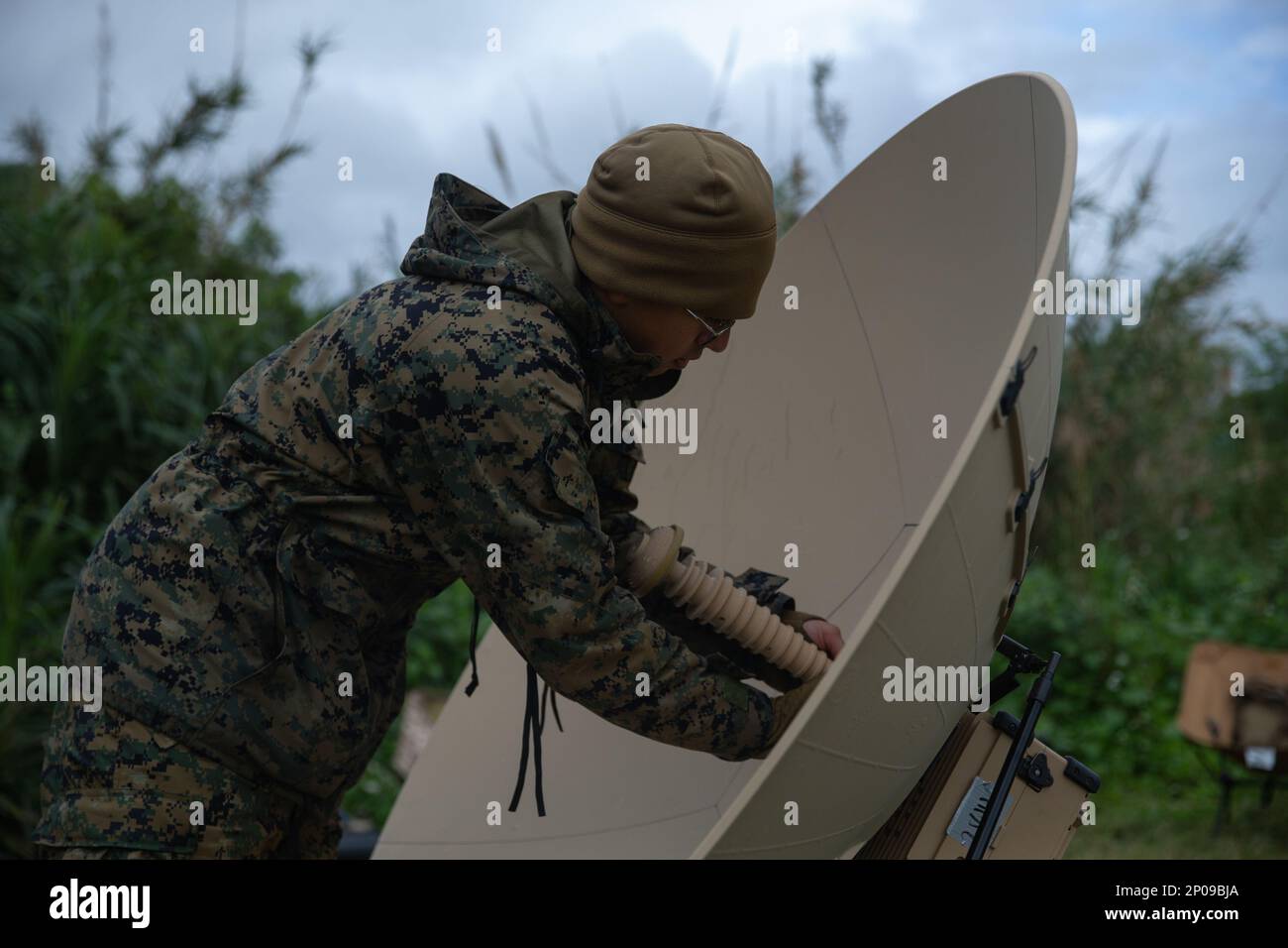U.S. Marine Corps Lance Cpl. Jesse Jimenez, a satellite communications ...