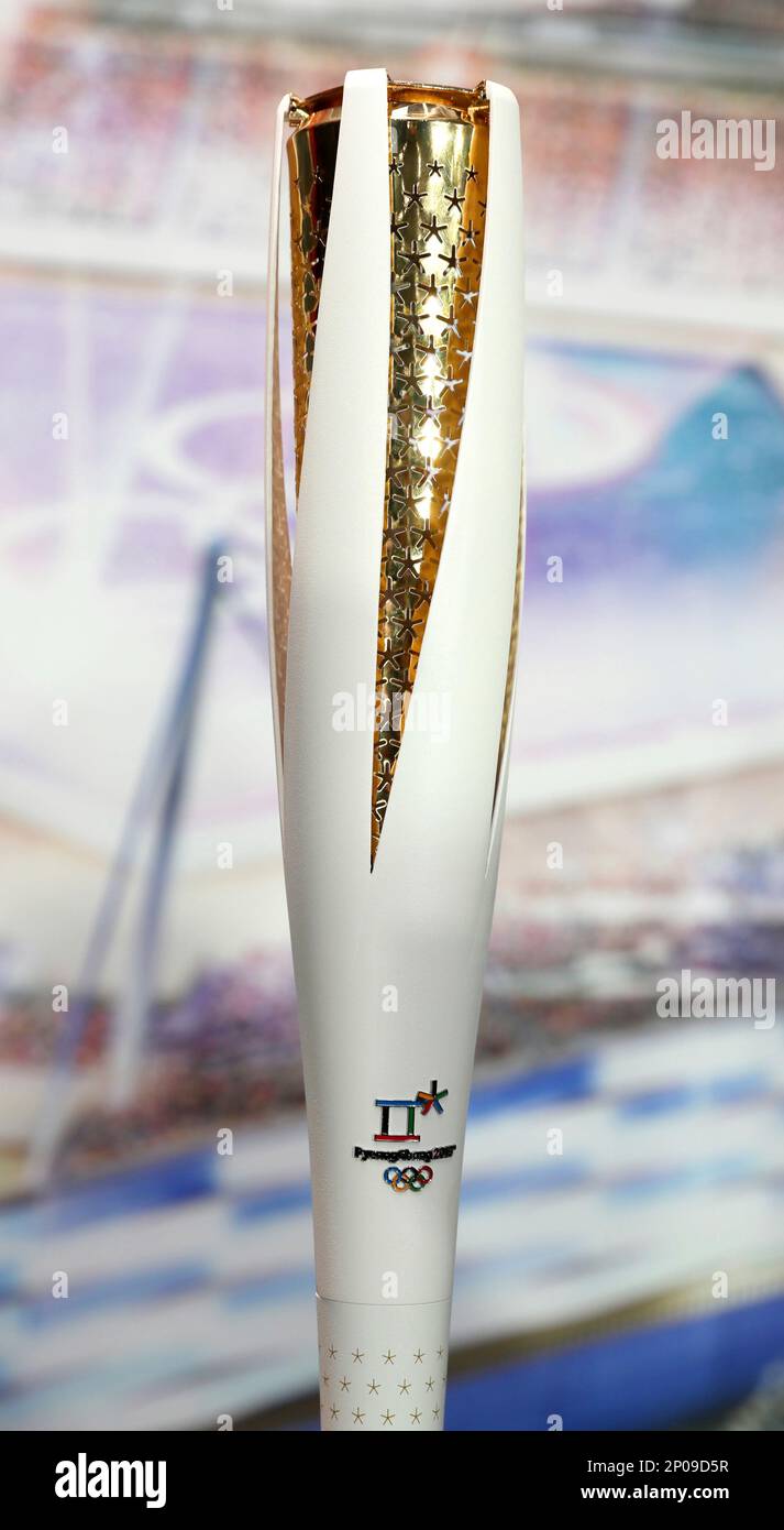 Torch and uniform for the runners in the torch relay of the Pyeong ...