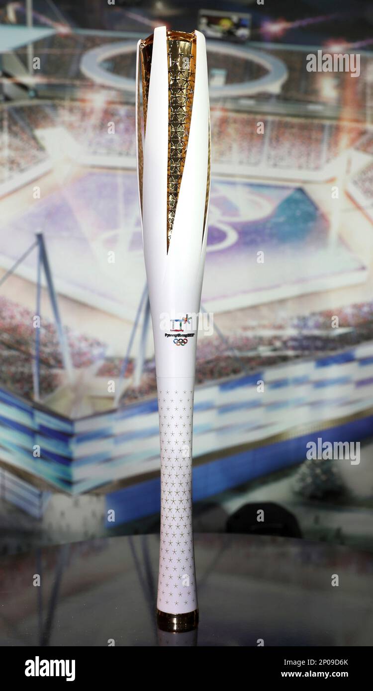 Torch and uniform for the runners in the torch relay of the Pyeong ...