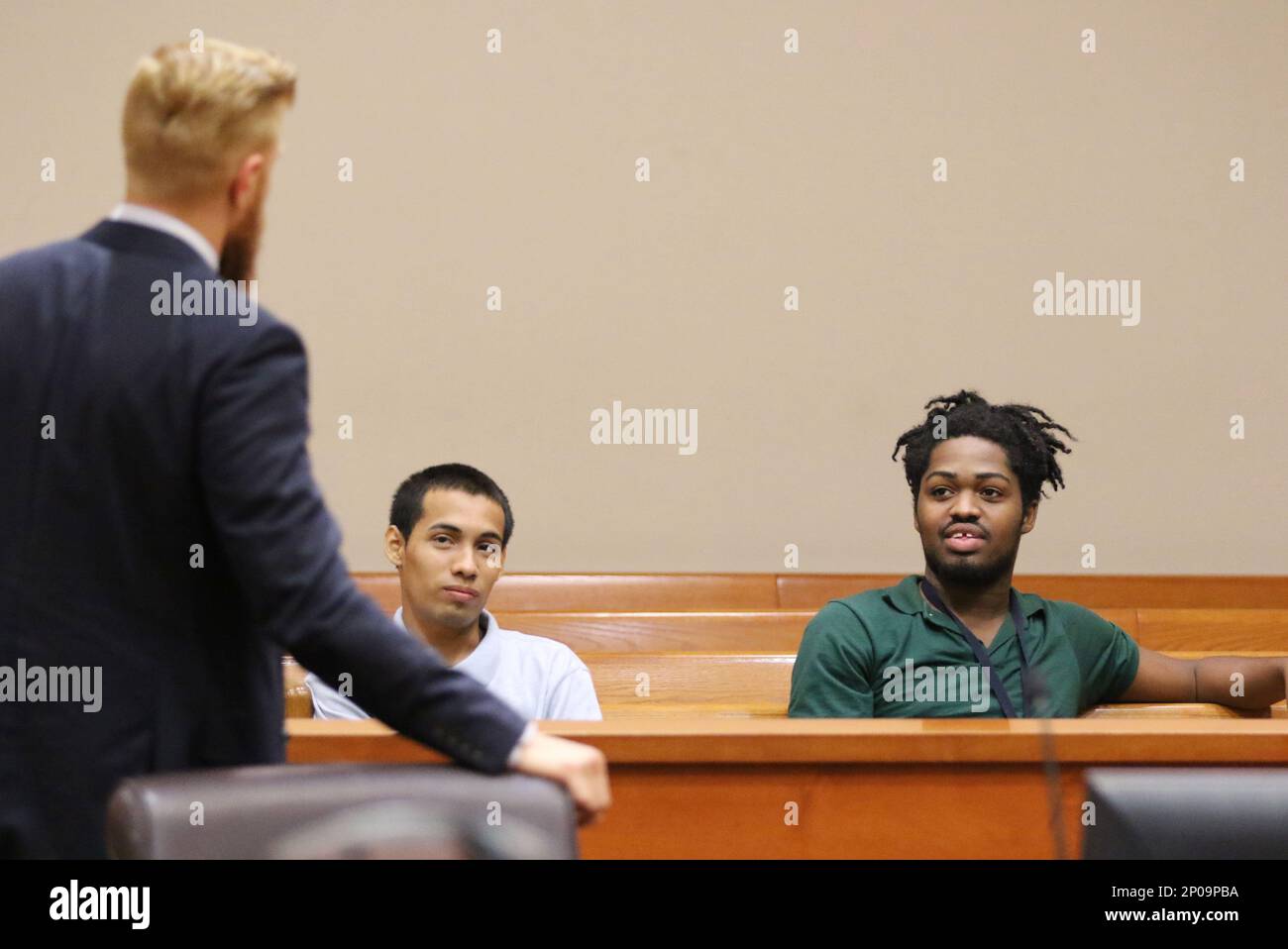 Lawyer David Lee Windecher speaks to a two young offenders, Luis Rangel ...