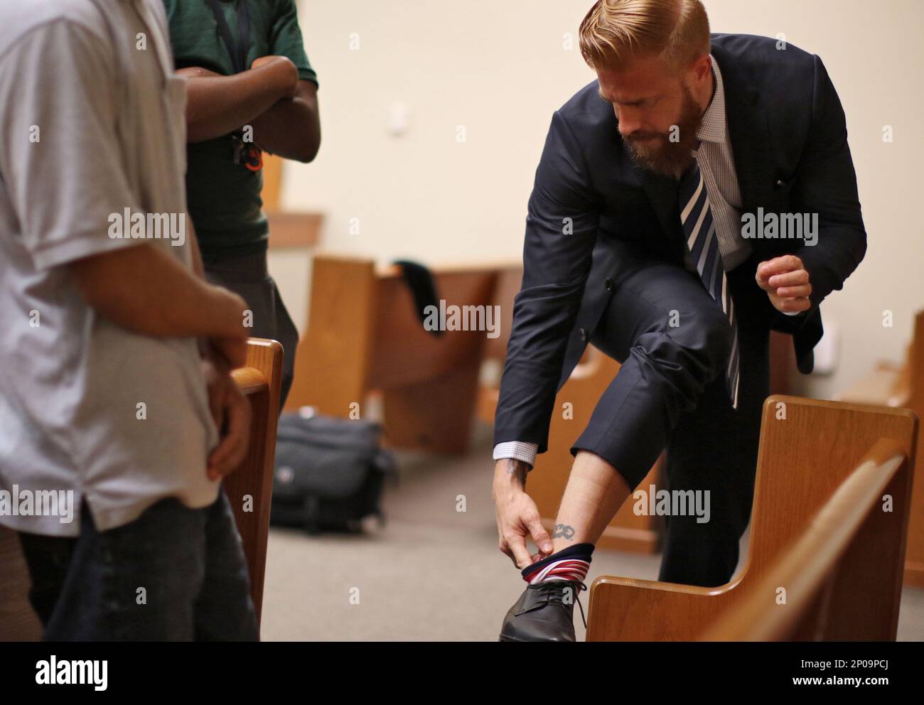 Lawyer David Lee Windecher shows some of his tattoos in Judge Asha ...