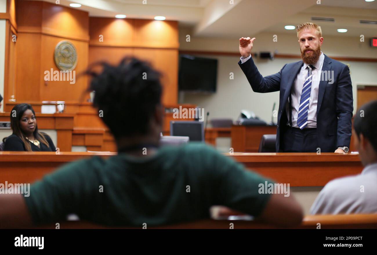 Lawyer David Lee Windecher speaks to a two young offenders, Luis Rangel ...