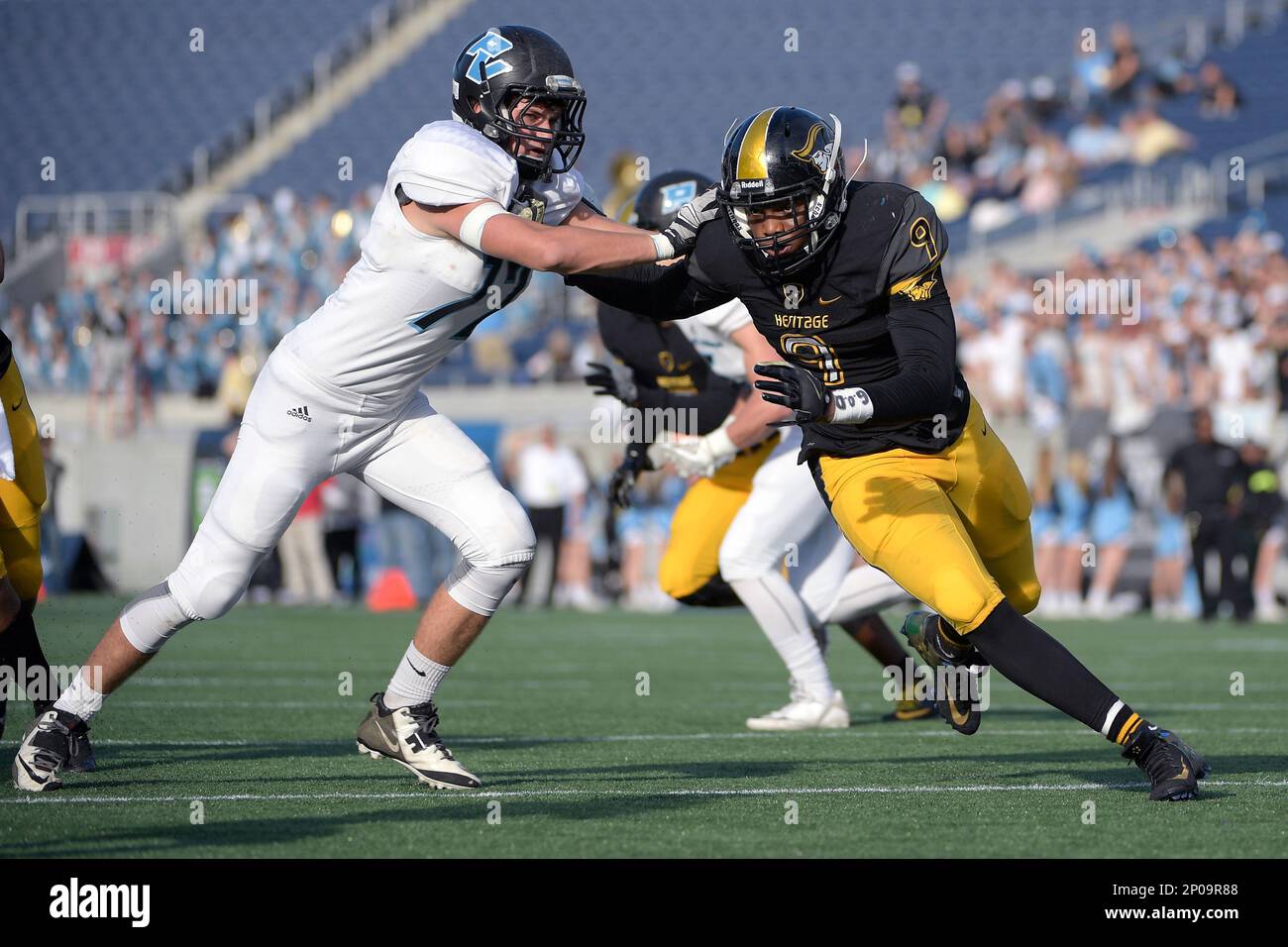 American Heritage defensive end Andrew Chatfield (9) rushes past Ponte ...