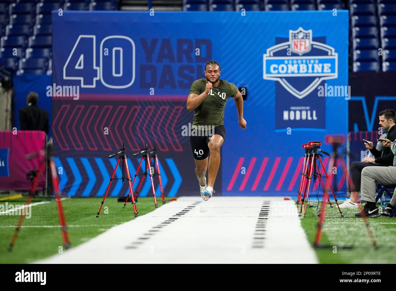 Michigan defensive lineman Mike Morris runs a drill at the NFL football ...