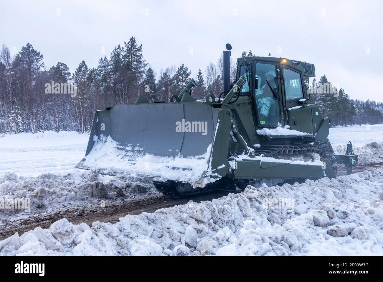 U.S. Marine Lance Cpl. Jess Barrett, a heavy equipment operator with ...