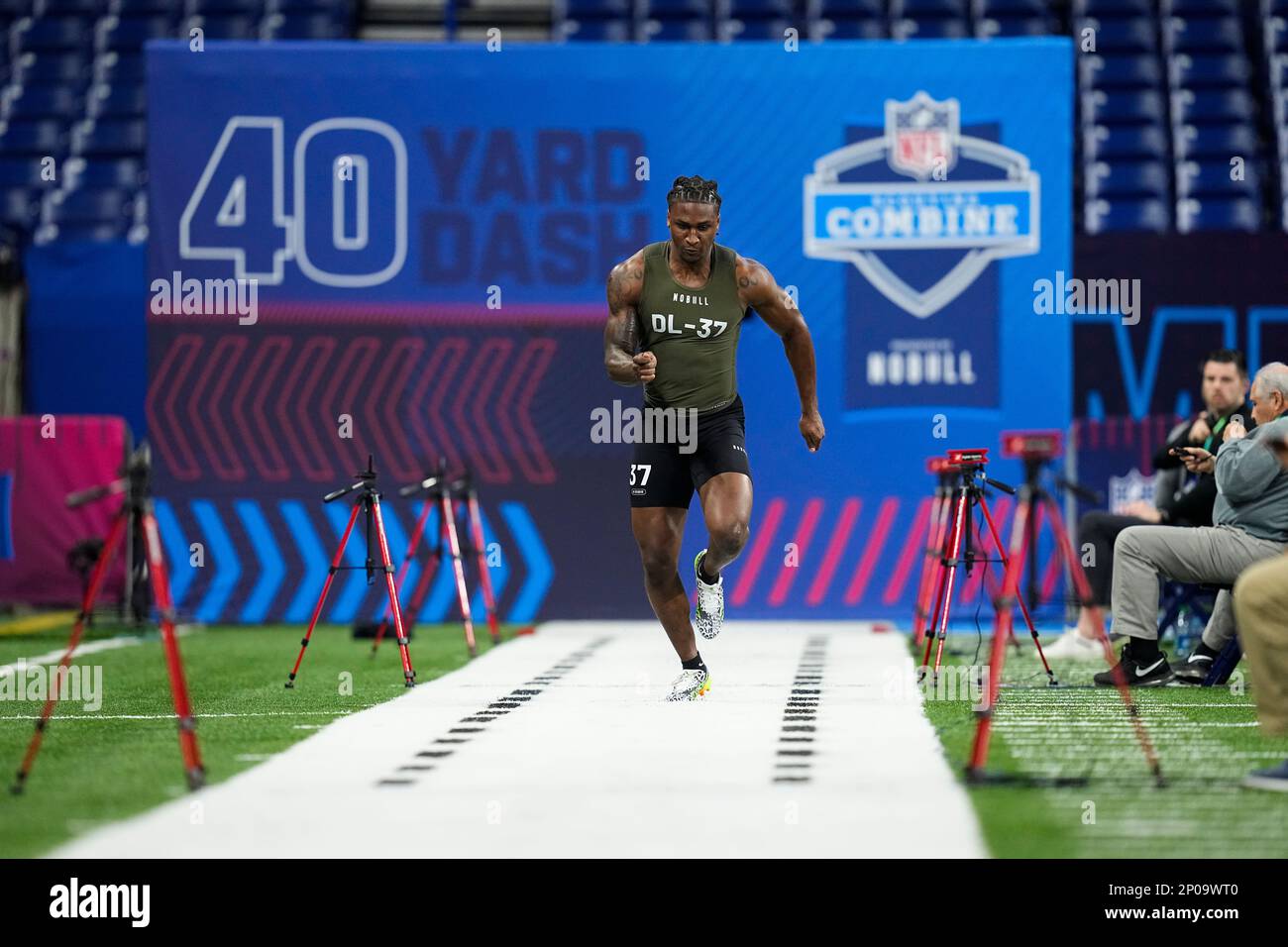 Florida A&M defensive lineman Isaiah Land runs a drill at the NFL ...