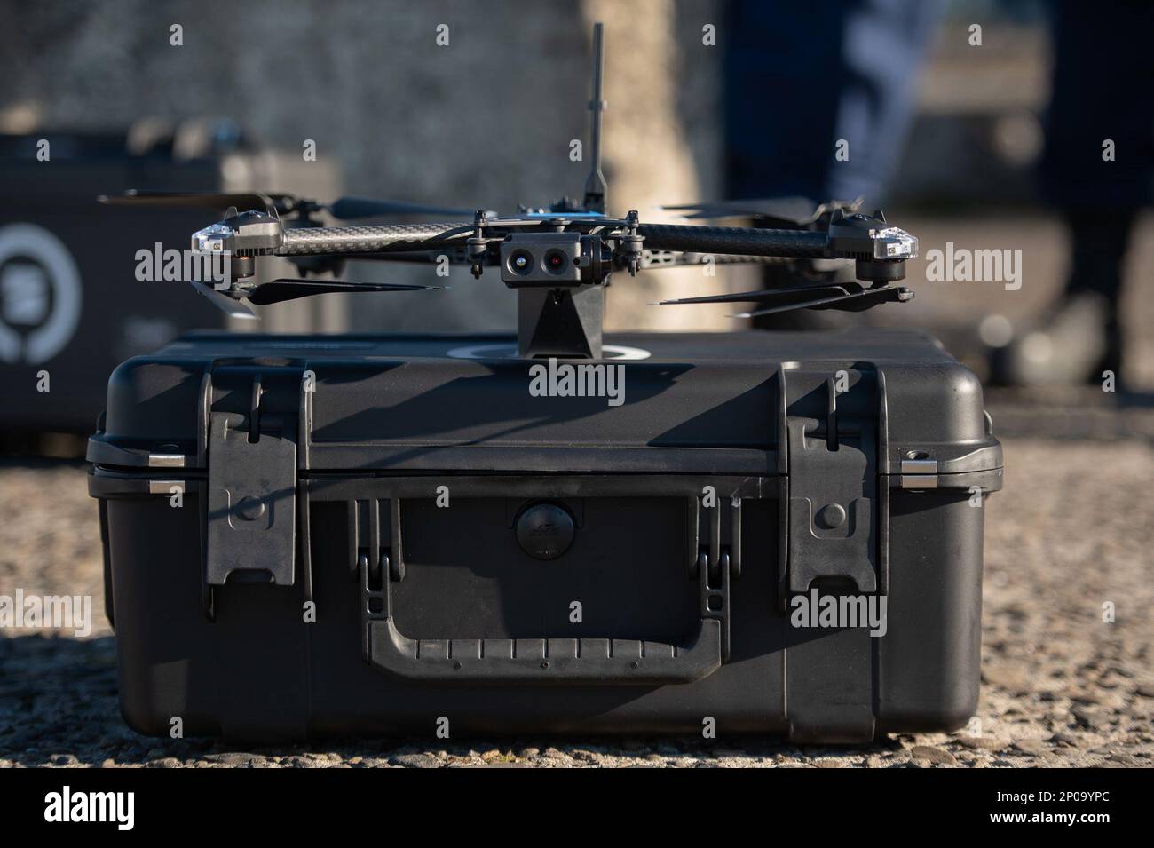 A Coast Guard unmanned aircraft system sits on top of its housing case ...