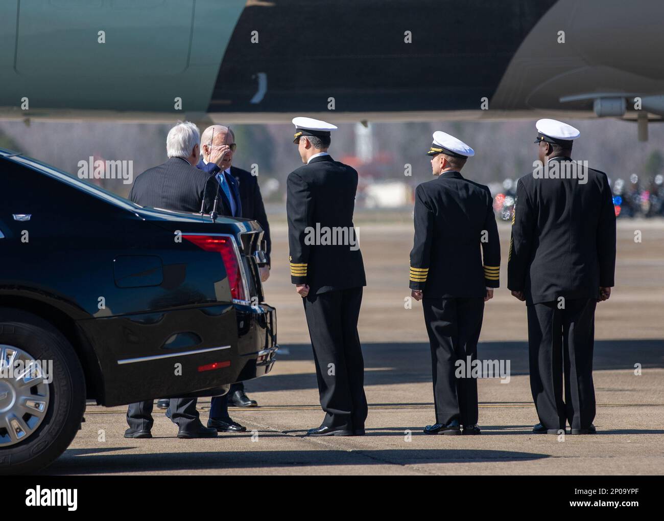 VIRGINIA BEACH, Va. (Feb. 28, 2023) President Joe Biden, left of center ...