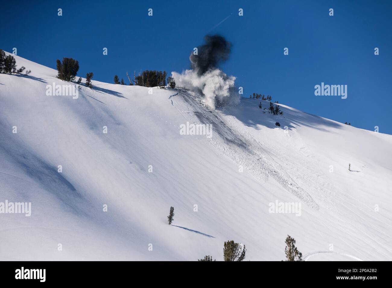 U.S. Marines attending Winter Mountain Engineer Course, trigger an ...