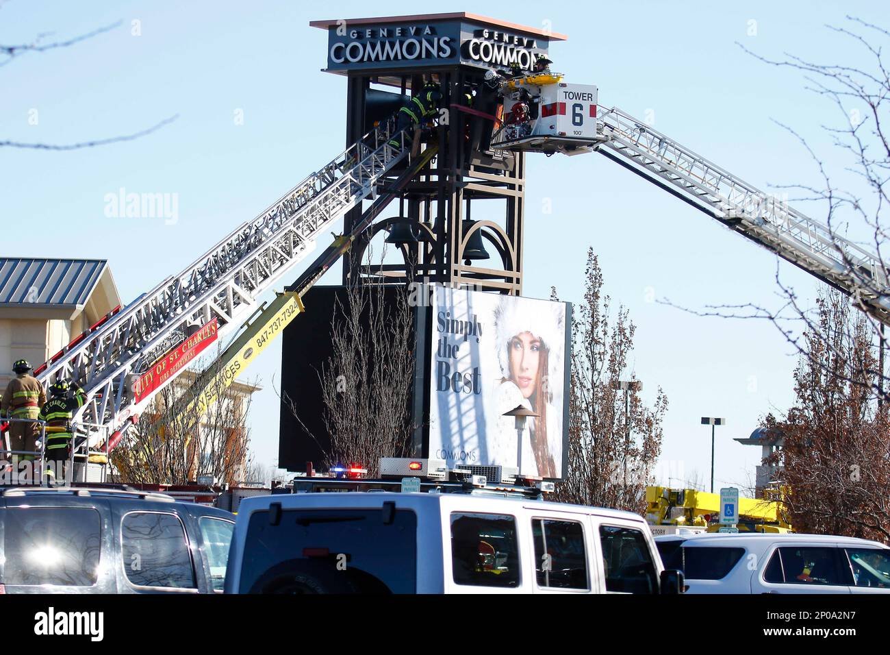 Rescue personnel work to free a subject who was crushed to death while ...