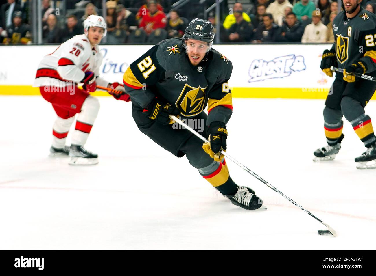 Vegas Golden Knights center Brett Howden (21) skates with the puck ...