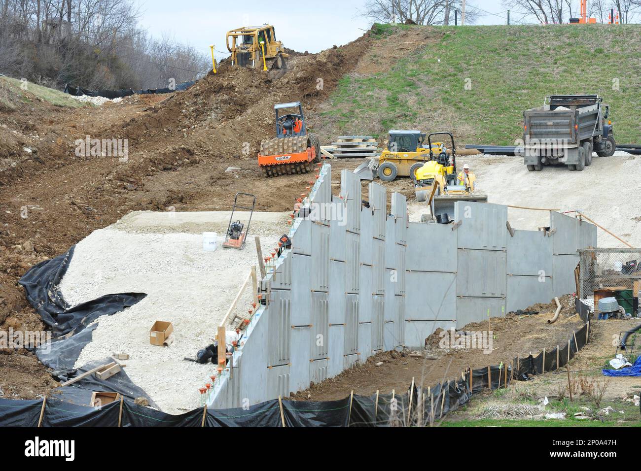 Work continues on the retaining wall at Ramp 1 as earth was moved to ...