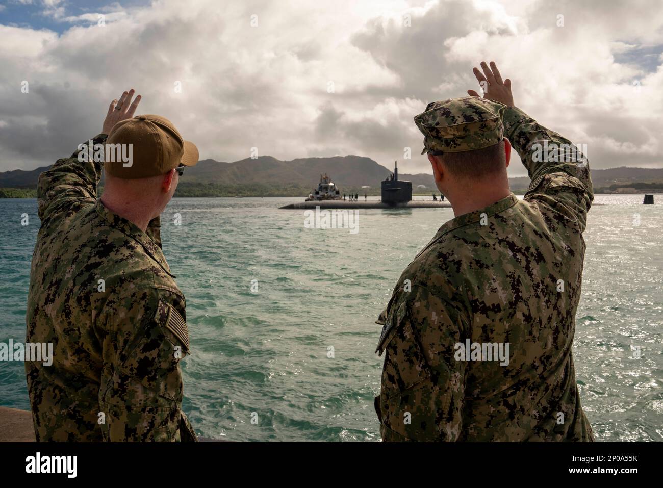 NAVAL BASE GUAM (Jan. 17, 2023) – Sailors wave goodbye to the Los ...