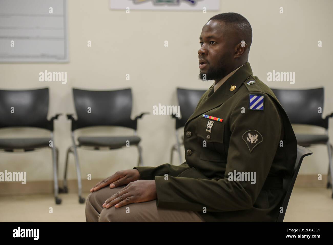 U.S. Army Spc. Passeba Kabore, assigned to the 24th Financial ...