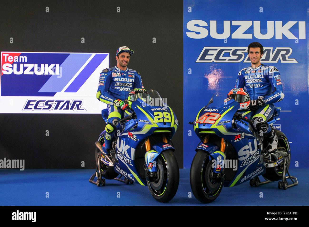 KUALA LUMPUR, MALAYSIA - JANUARY 29: Andrea Iannone and Alex Rins of ...