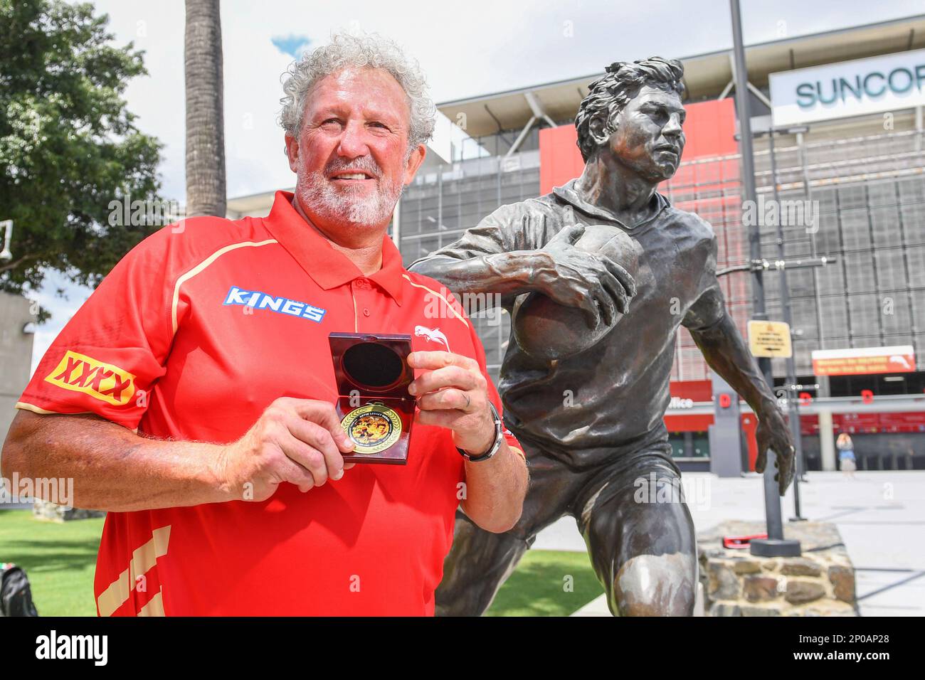 Brad Beetson, son of Arthur Beetson poses with his fathers statue and ...