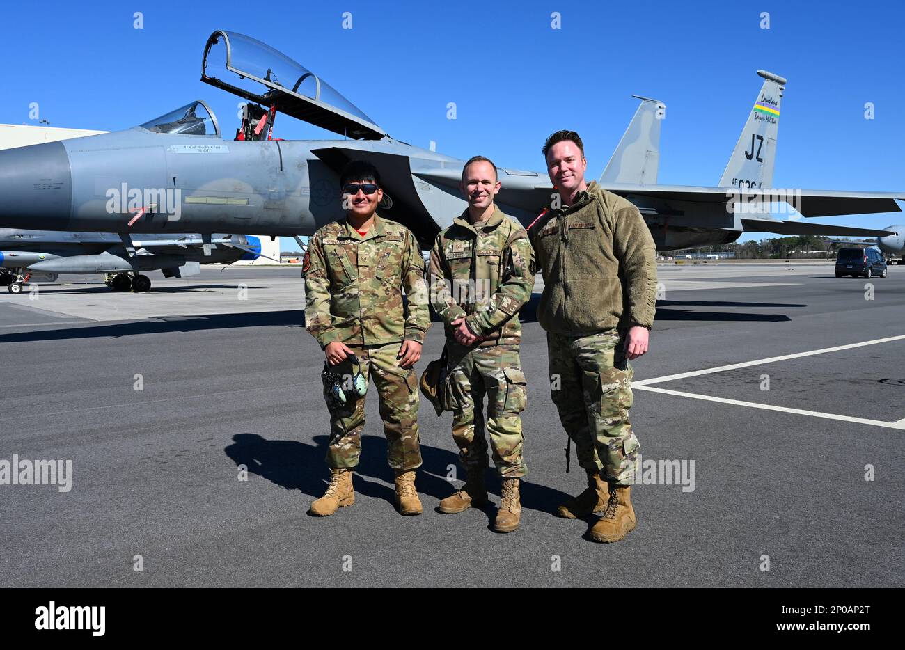 Members of the Louisiana National Guard’s 159th Fighter Wing pose in front of their F-15C Eagle ...